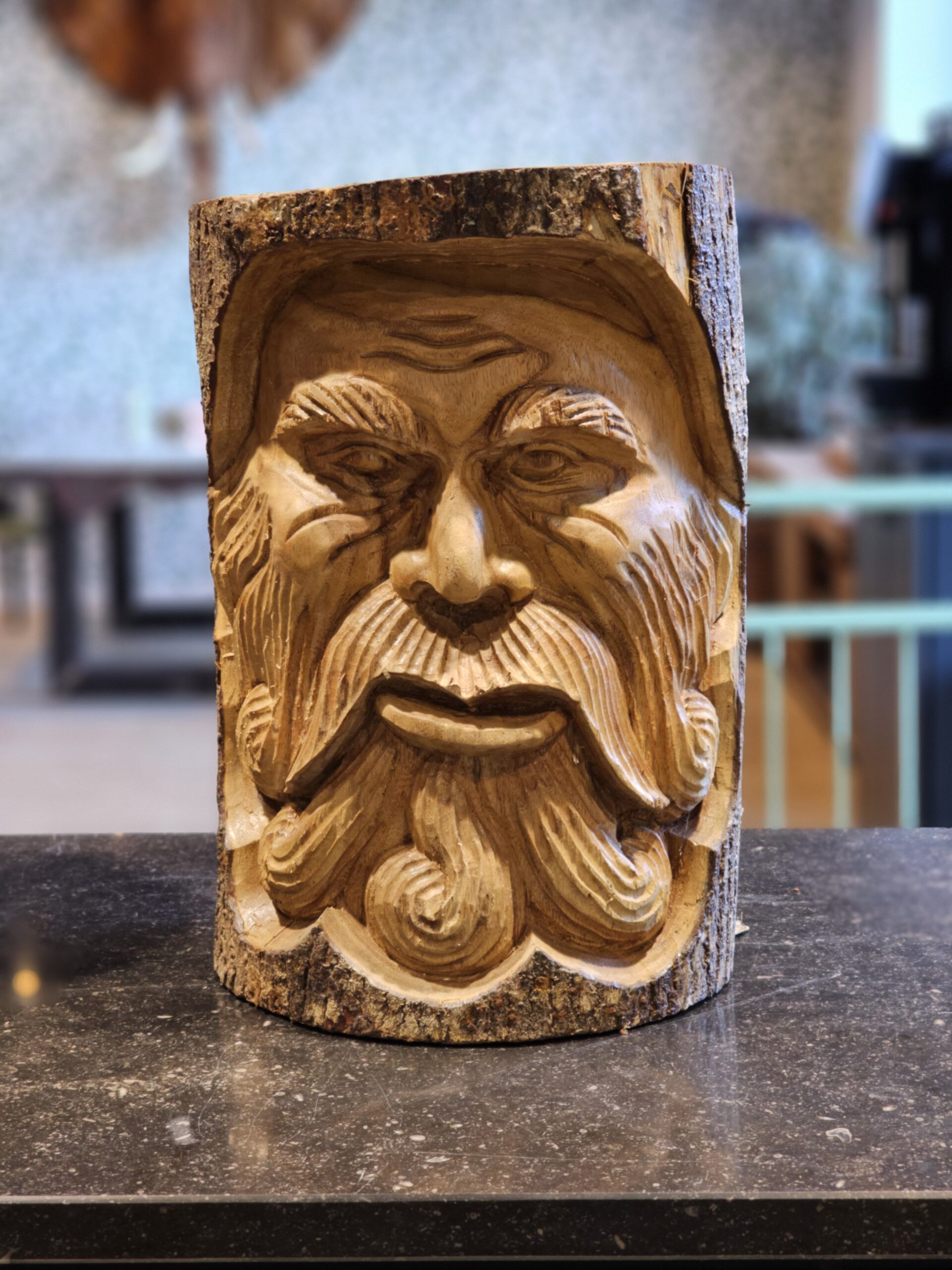 Tree trunk with hand-carved forest creature 50cm